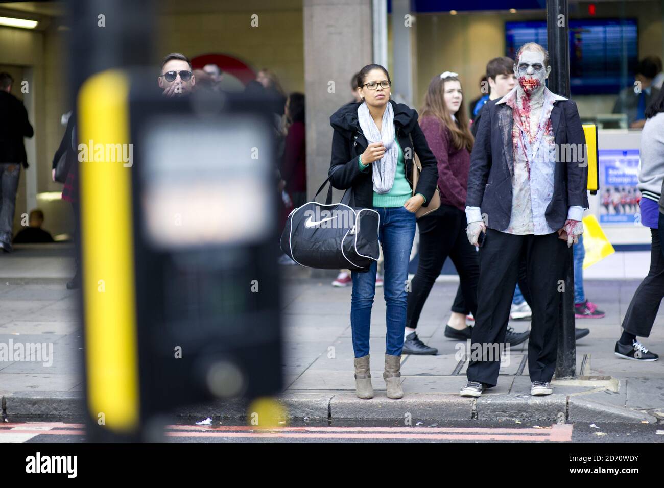 People dressed as zombies parade along Oxford Street, London, as part ...