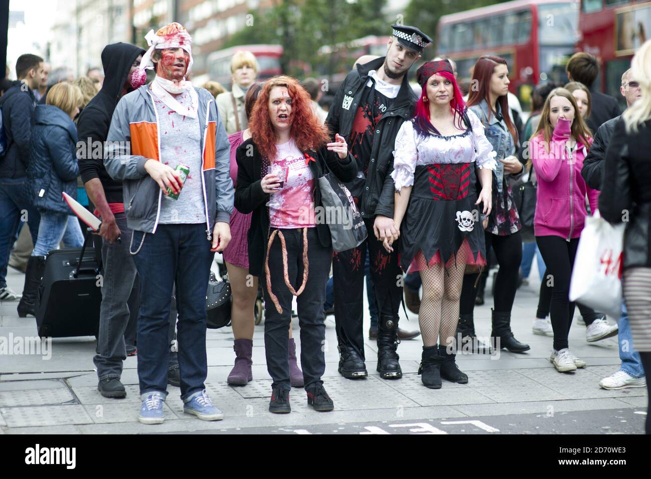 People dressed as zombies parade along Oxford Street, London, as part ...