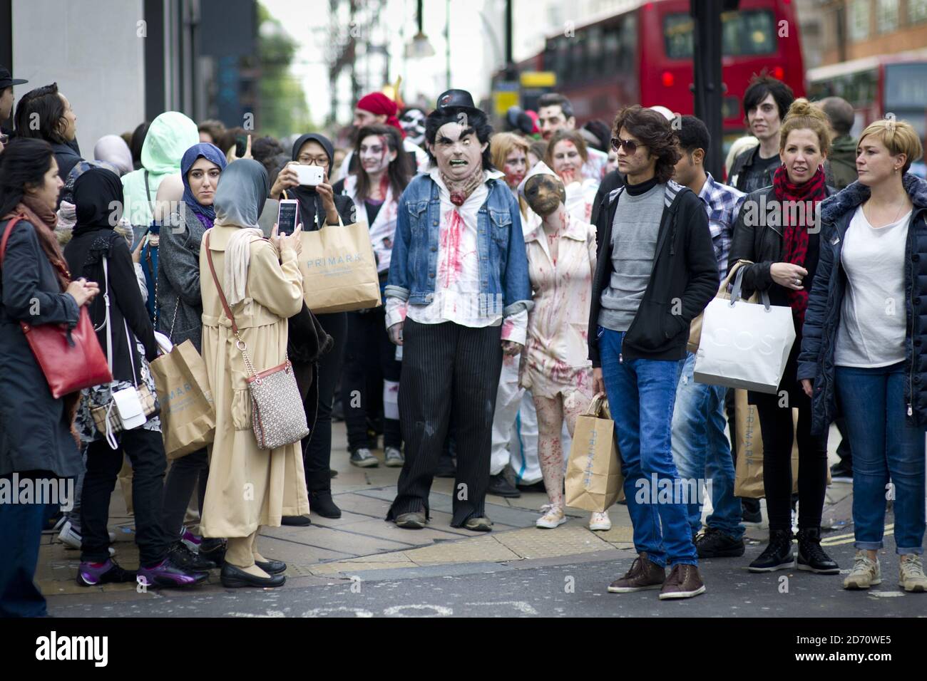 People dressed as zombies parade along Oxford Street, London, as part ...