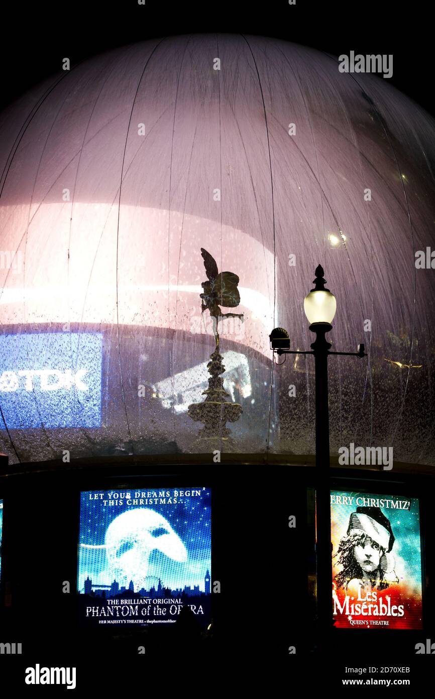 General view of a giant Snow Globe around Eros, in Piccadilly Circus ...