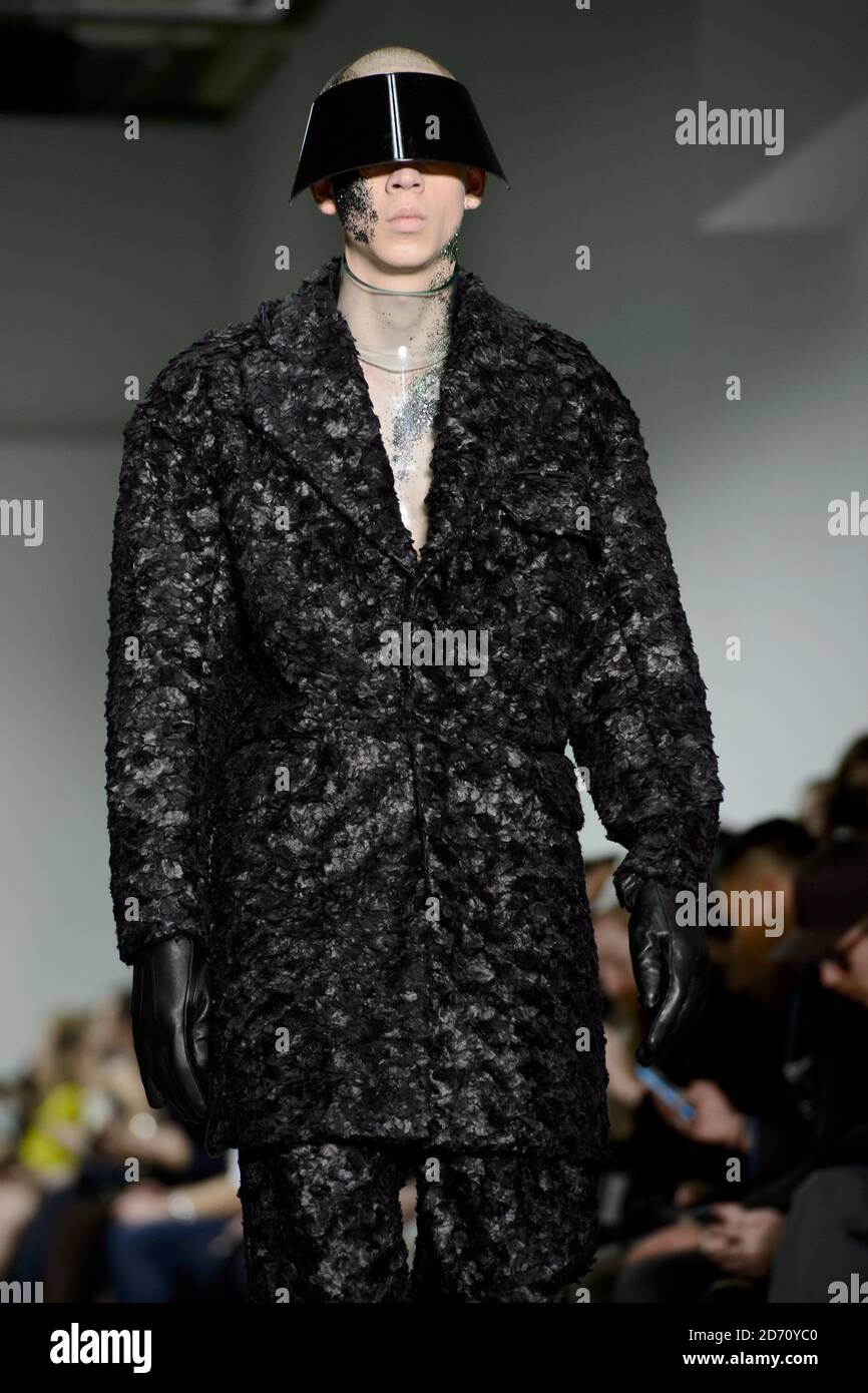 A model on the catwalk at the Kay Kwok fashion show, held at the ...