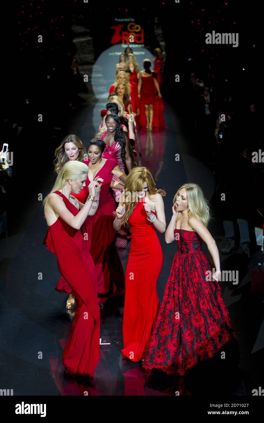 Models on the catwalk at the Go Red For Women: The Heart Truth Red ...