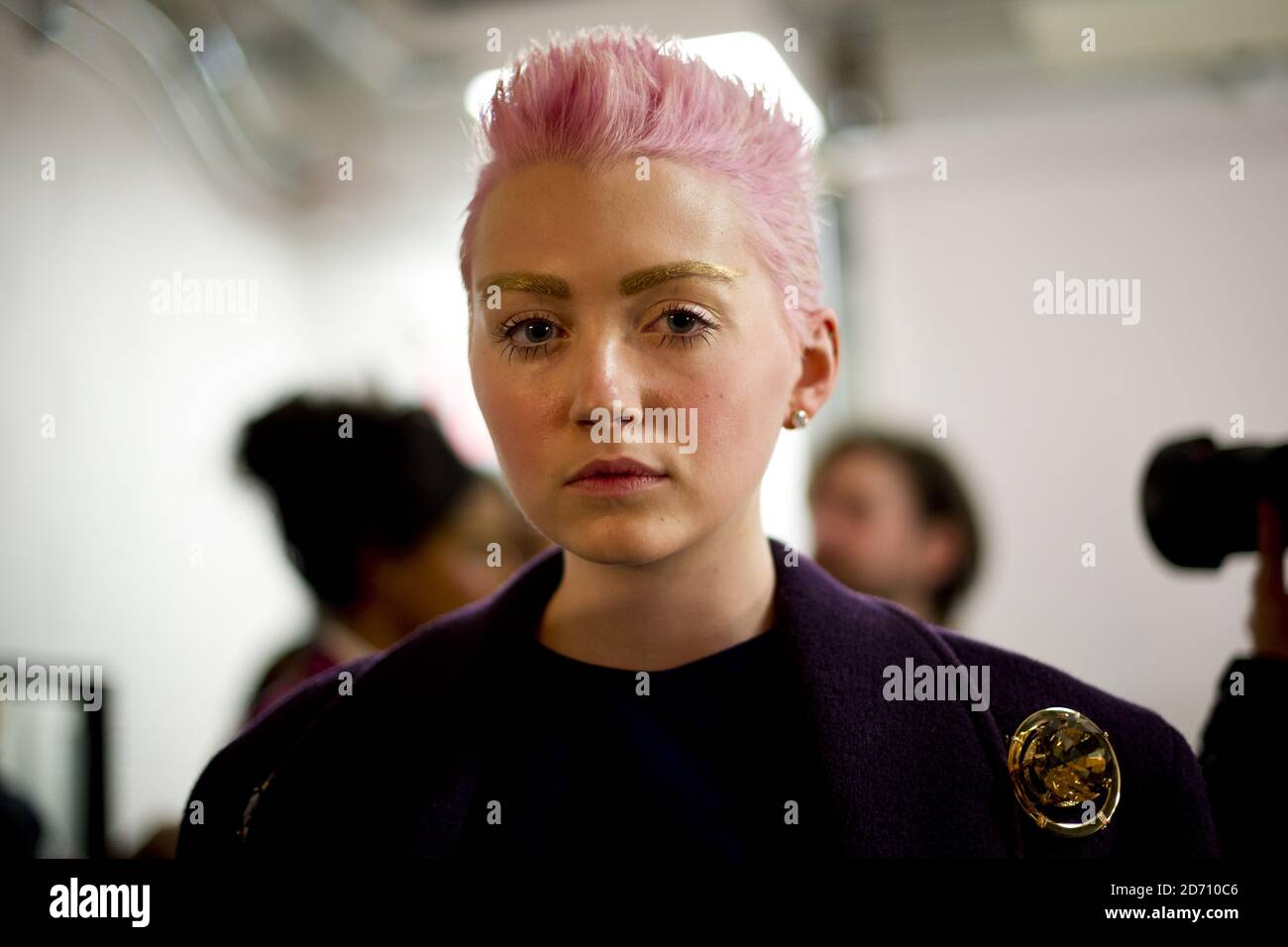 Models prepare backstage at the Jerome fashion show, held at the ...