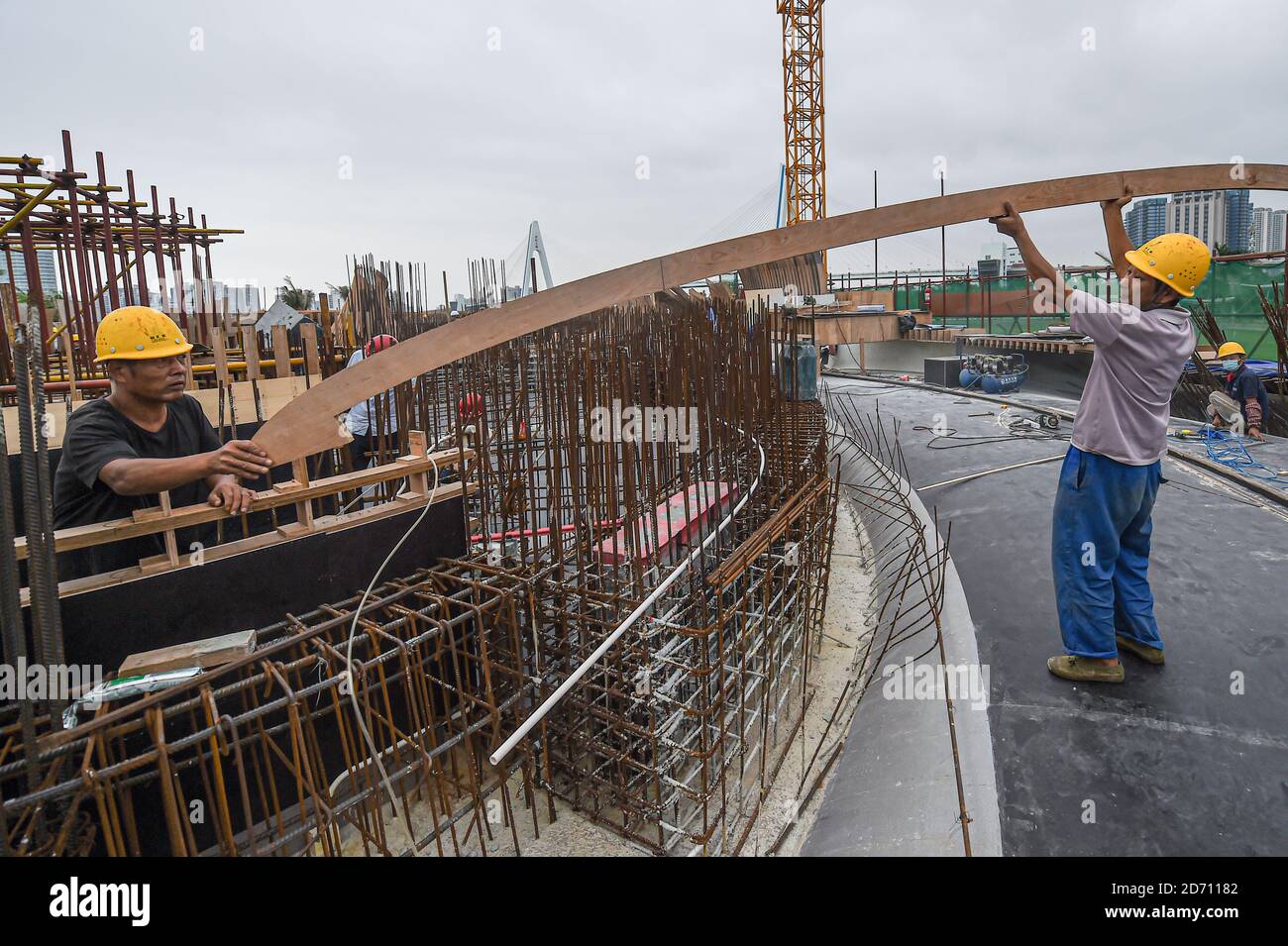 Haikou, China's Hainan Province. 20th Oct, 2020. People work at the ...
