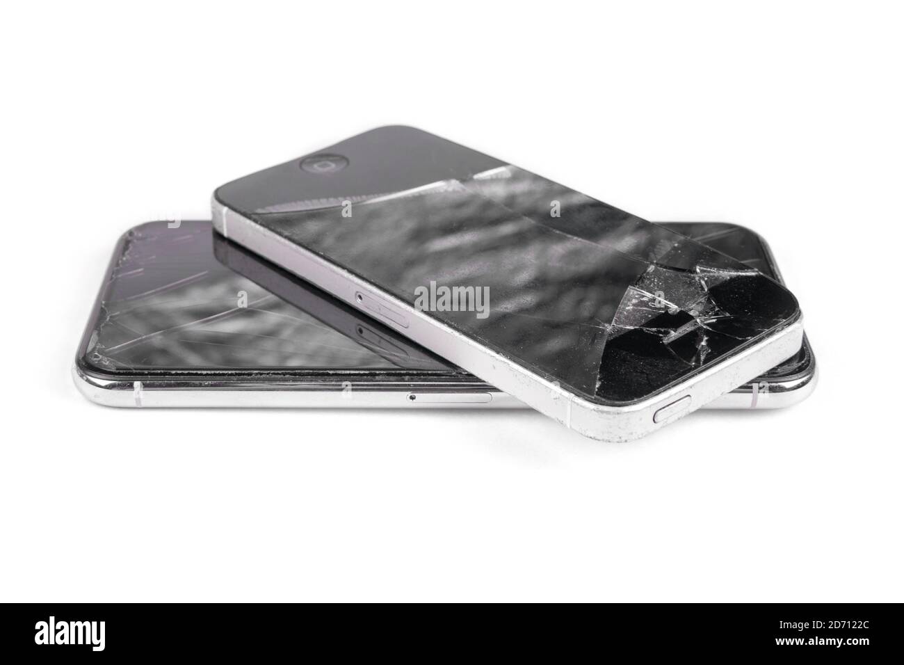 Broken phones with broken screen on isolated background Stock Photo - Alamy
