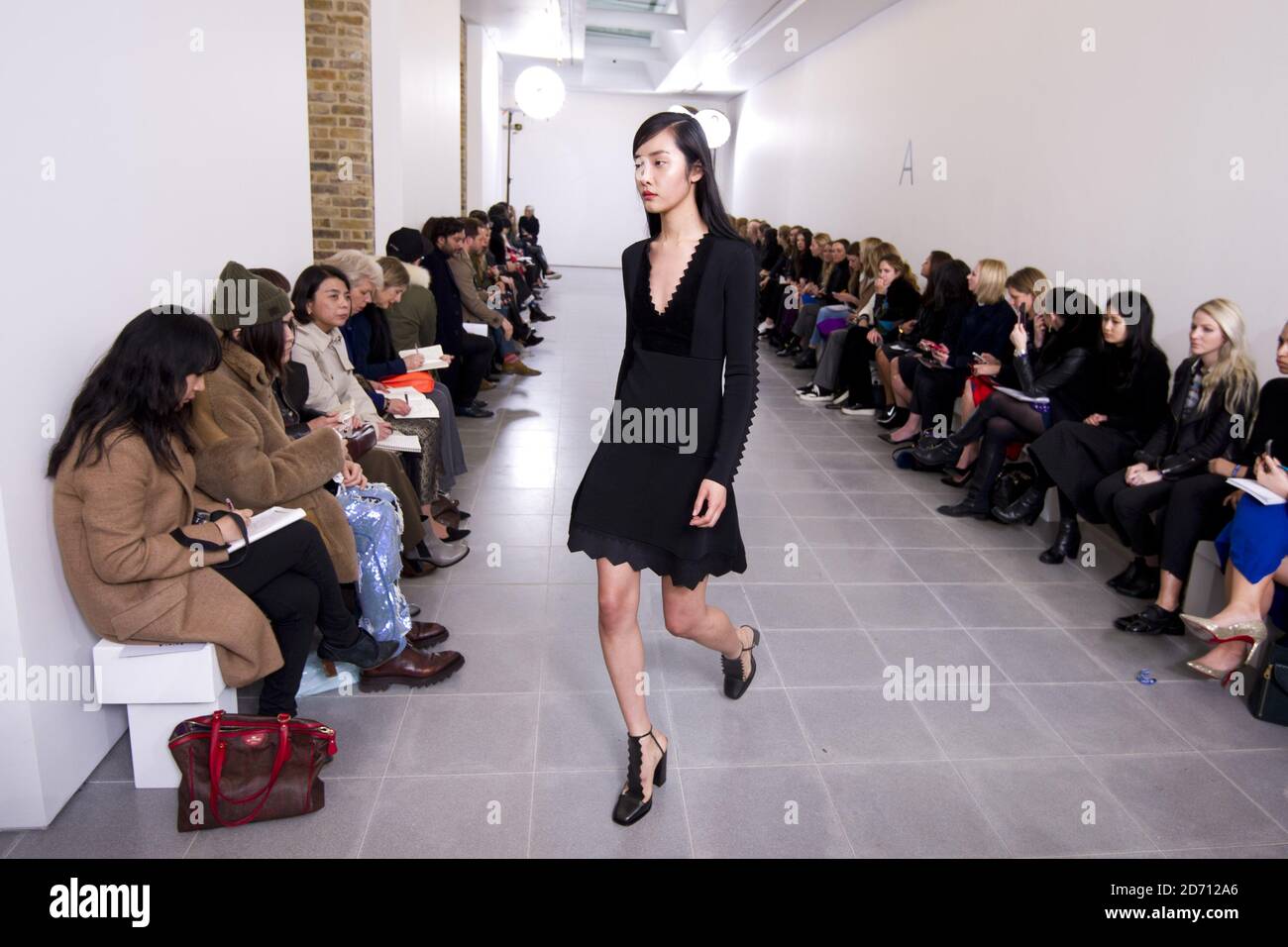 A model on the catwalk at the Issa fashion show, held at the Serpentine ...