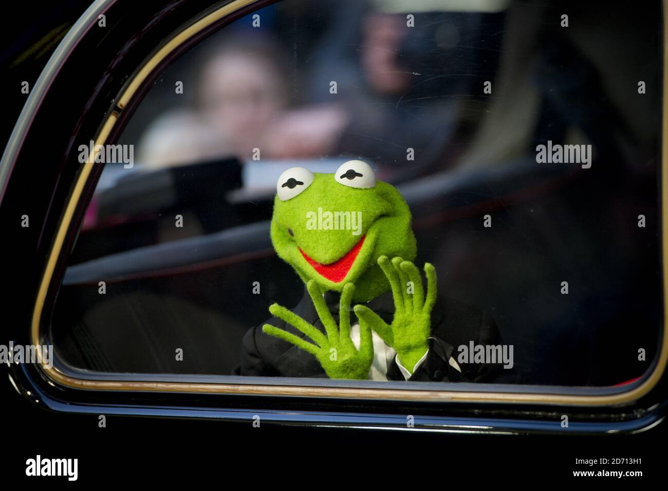Kermit the Frog arriving at the premiere of Muppets Most Wanted, at the ...