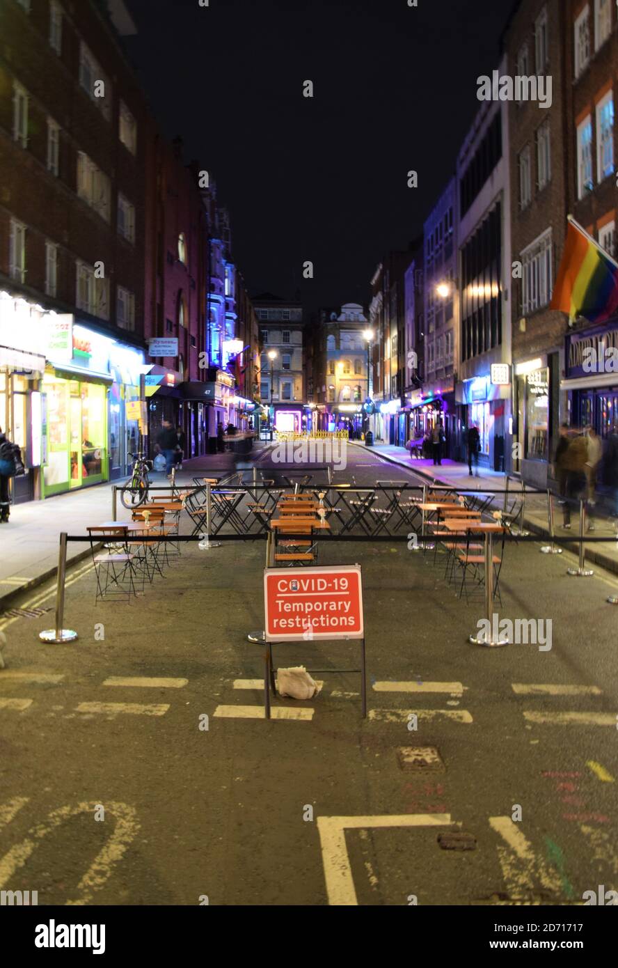 Closed bars and restaurants and nearly empty Old Compton Street in Soho ...