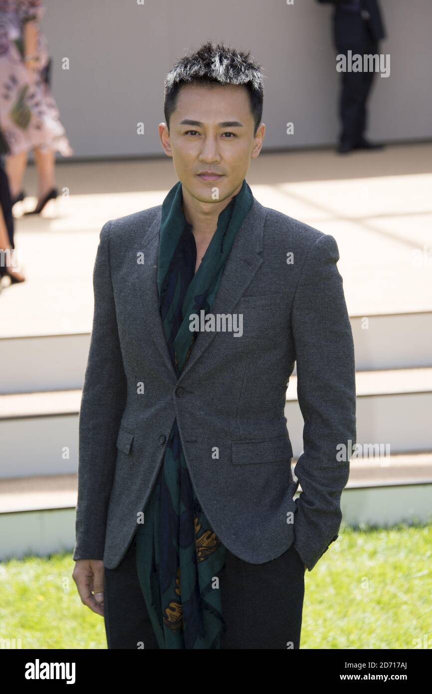 Raymond Lam attending the Burberry fashion show, held in Kensington ...