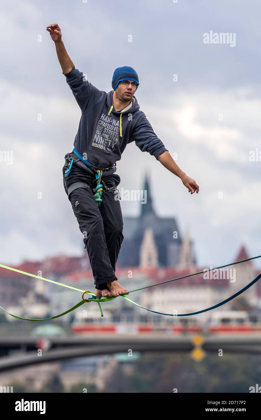 Balancing along a suspended length of flat webbing hi-res stock ...