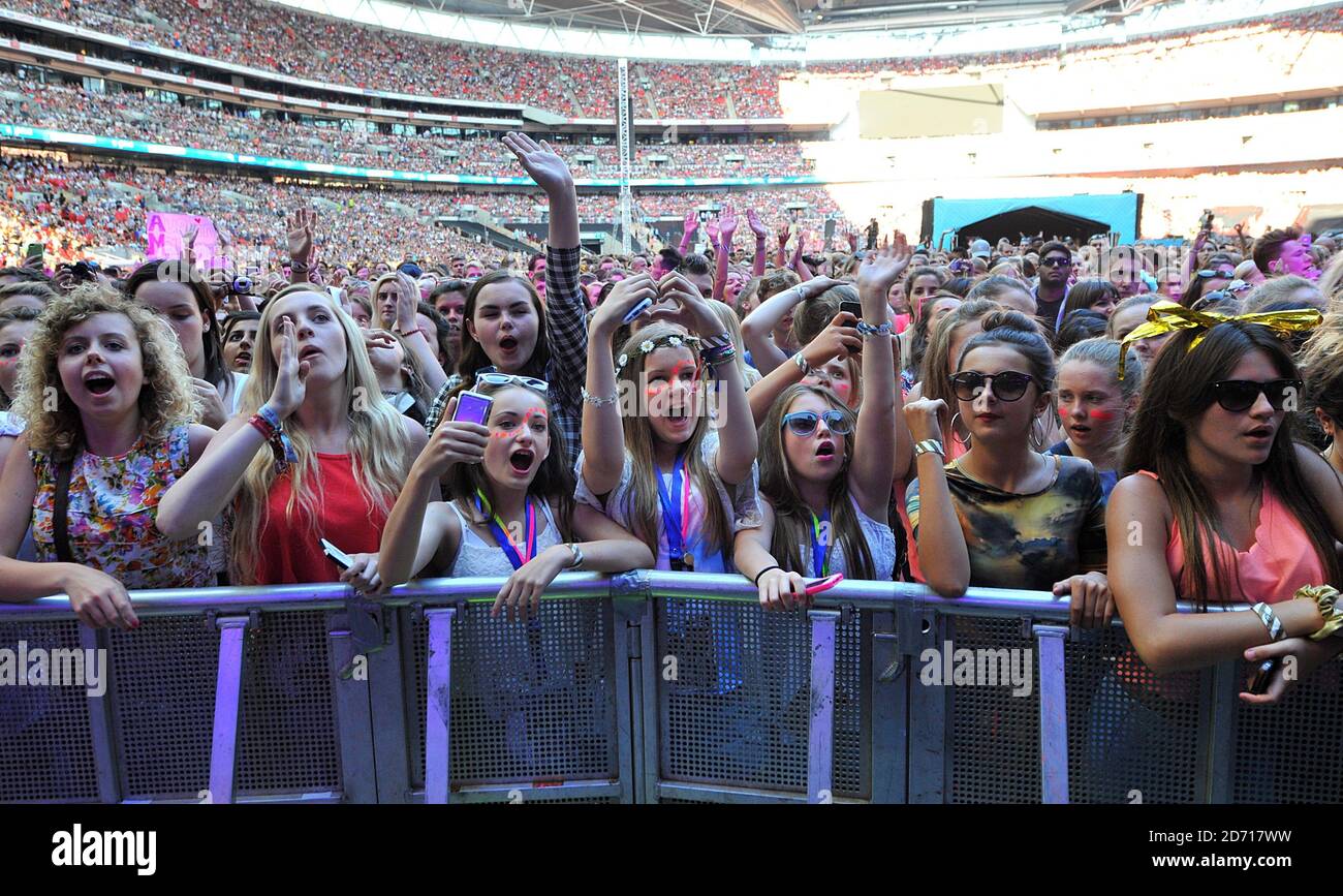 Giant inflatable balloons are passed around the crowd during Capital FM ...