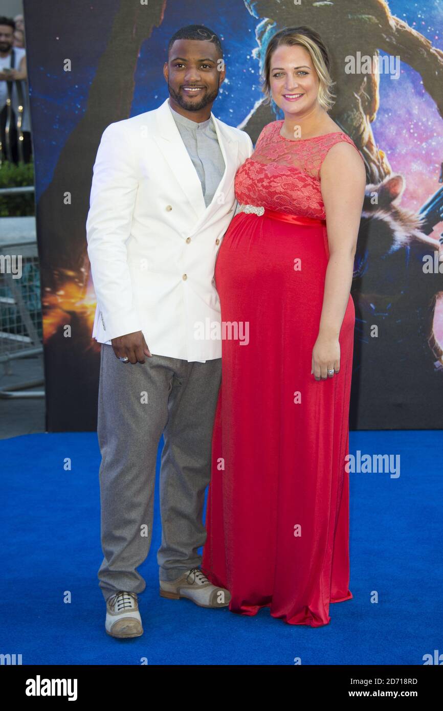 JB Gill and his wife Chloe attending the premiere of Guardians Of The ...
