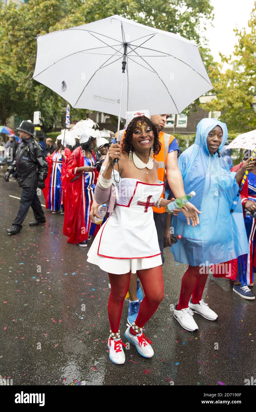 Dancers along the parade route at the Notting Hill Carnival in west ...