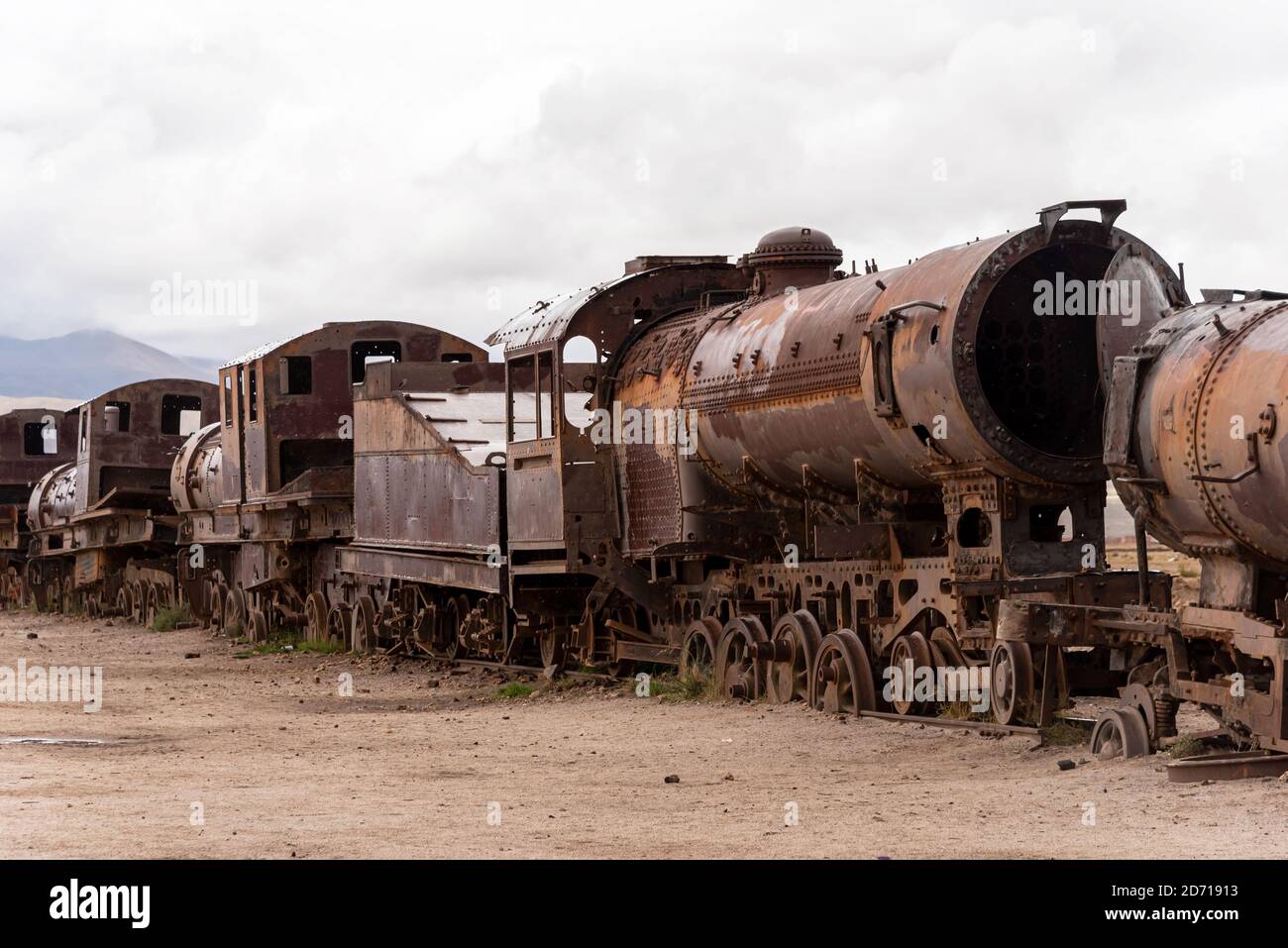 Old rusty locomotive abandoned in a train cemetery. Uyuni, Bolivia ...