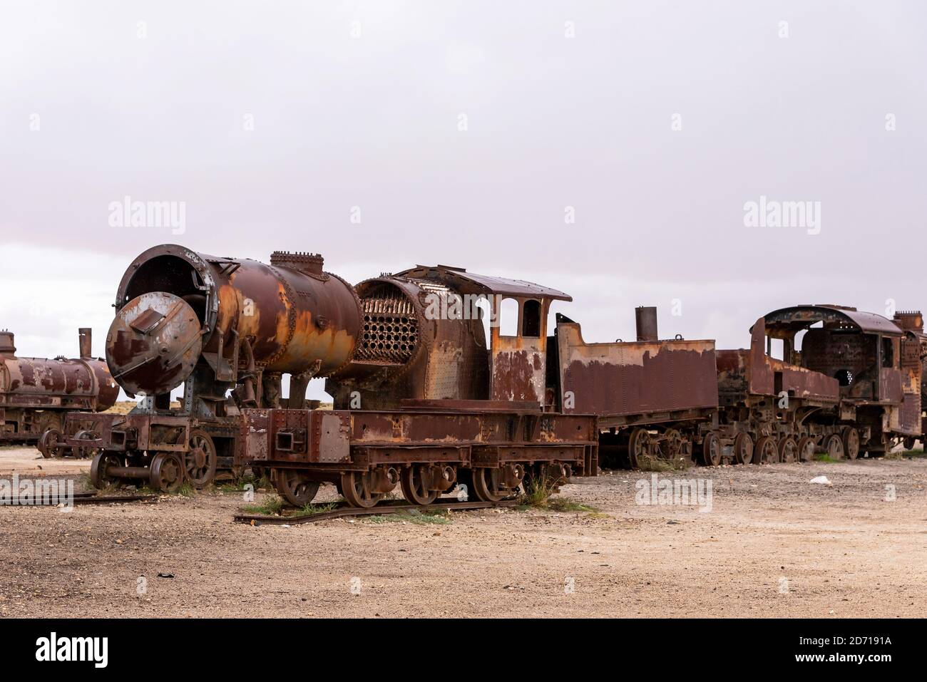 Old rusty locomotive abandoned in a train cemetery. Uyuni, Bolivia ...