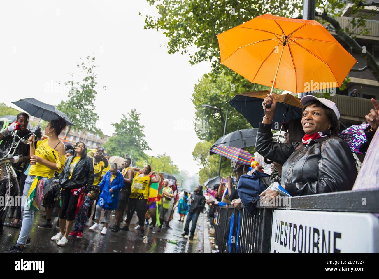 Dancers along the parade route at the Notting Hill Carnival in west ...