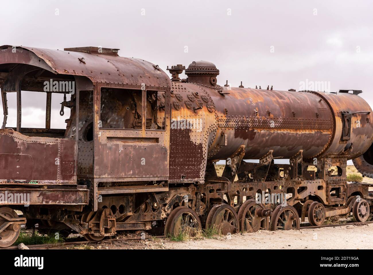 Old rusty locomotive abandoned in a train cemetery. Uyuni, Bolivia ...