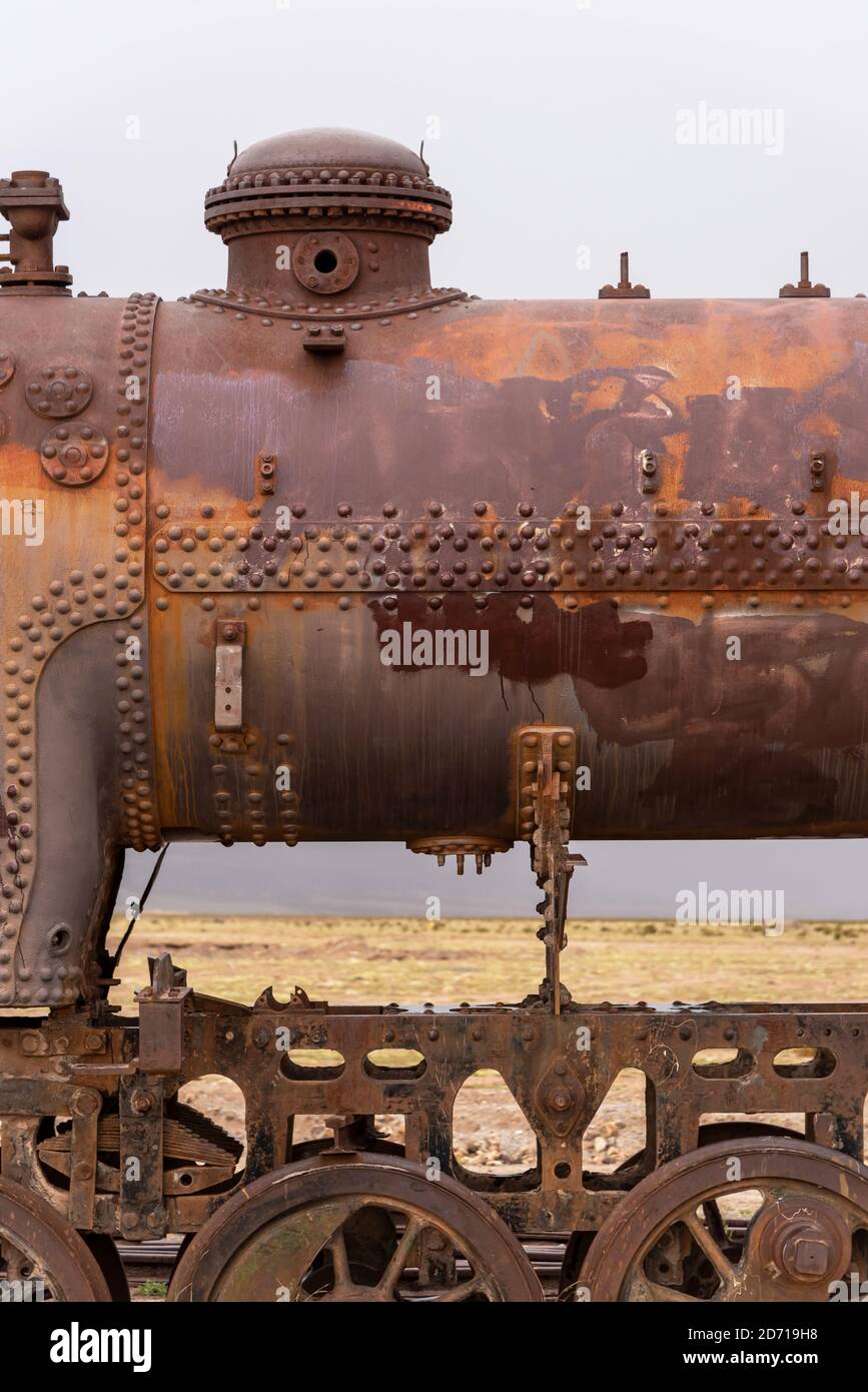 Old rusty locomotive abandoned in a train cemetery. Uyuni, Bolivia ...