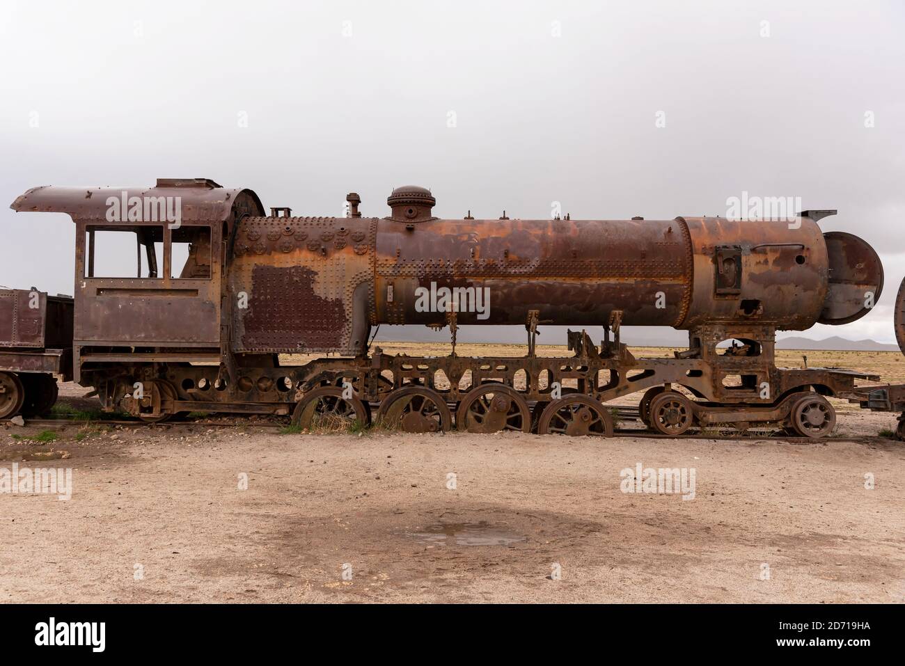 Old rusty locomotive abandoned in a train cemetery. Uyuni, Bolivia ...