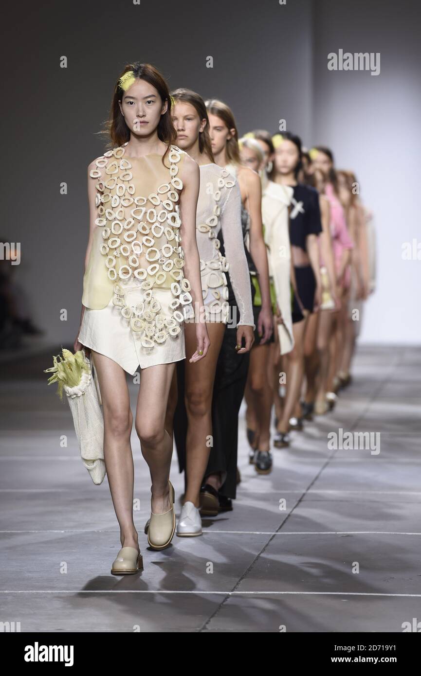 A model wears a design by Helen Lawrence during the Fashion East show ...