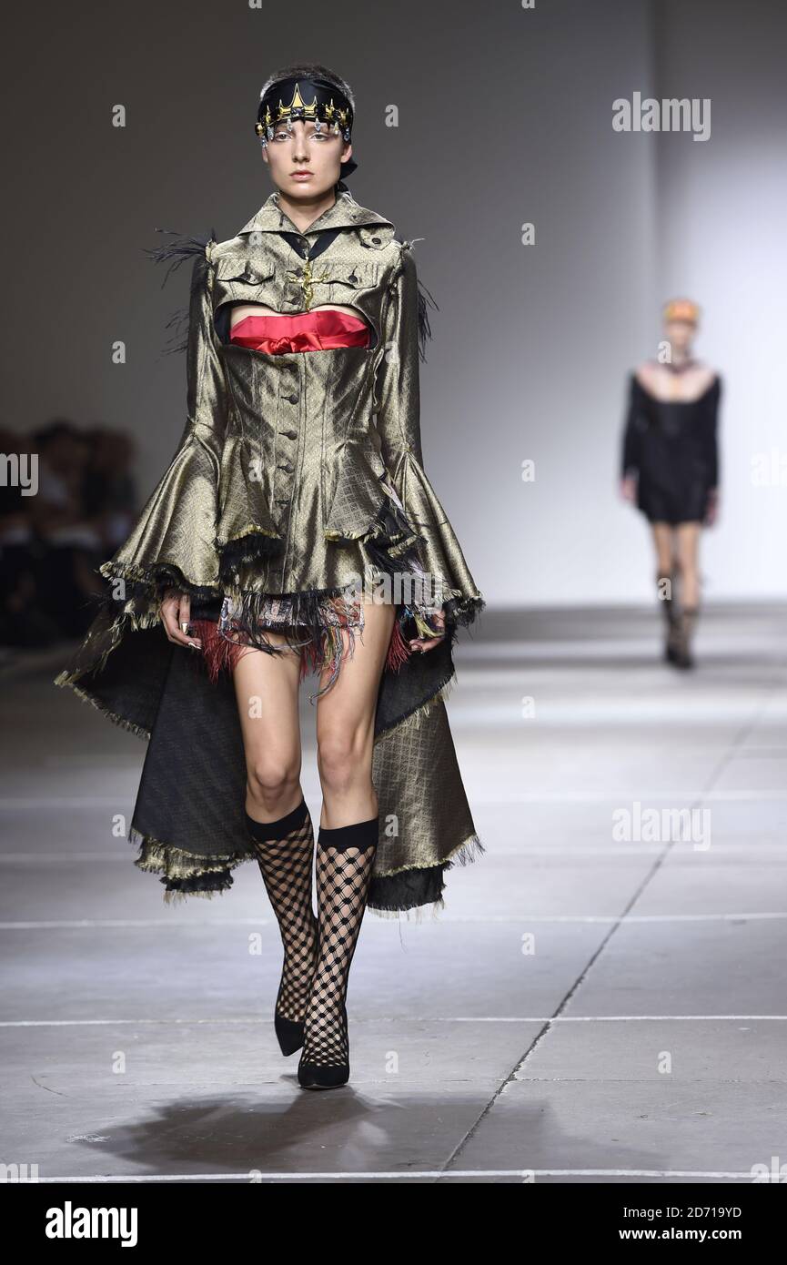 A model wears a design by Ed Marler during the Fashion East show, held ...