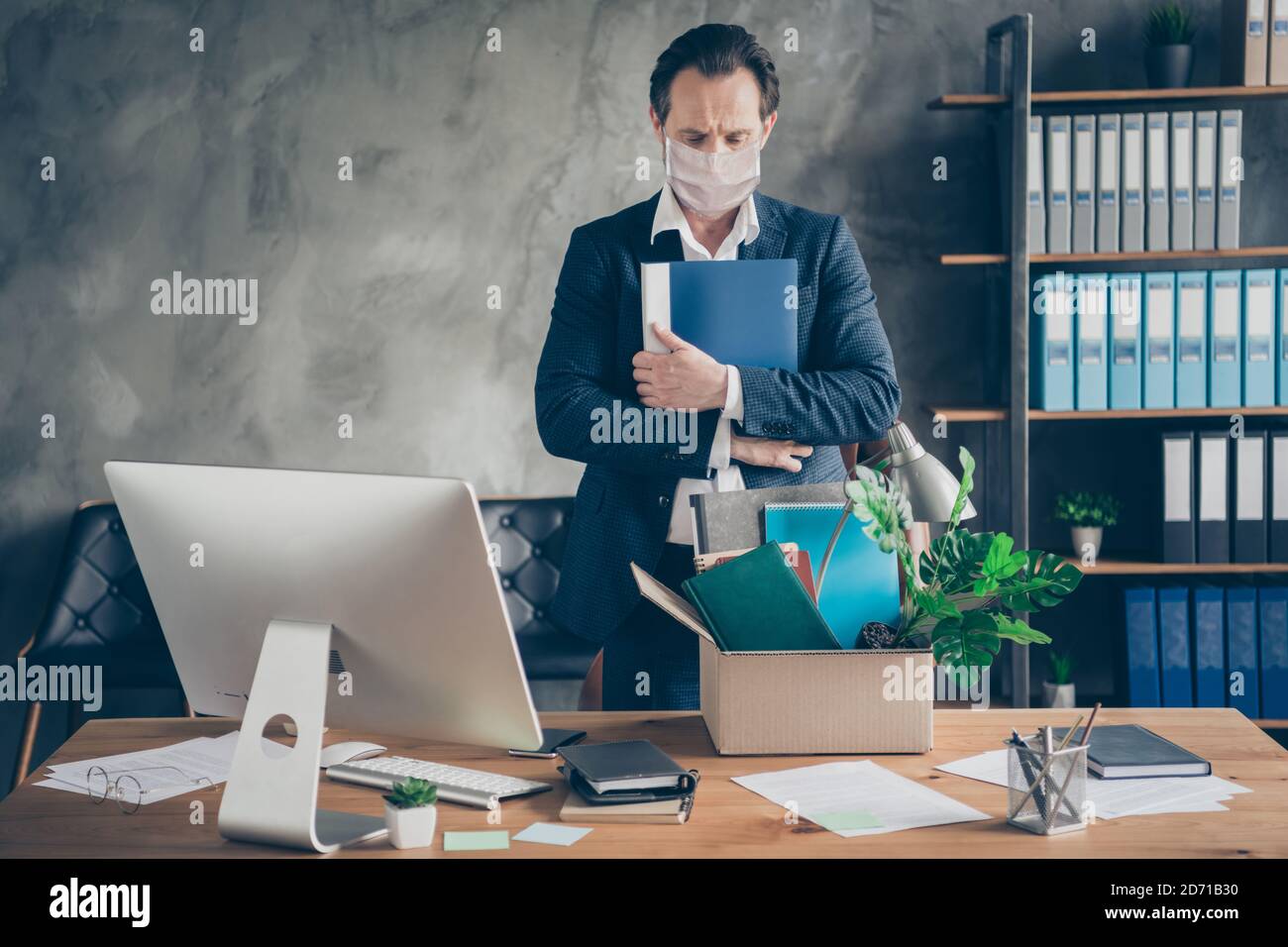 Photo of sad worker mature guy manager loser hold hug diary pack ...