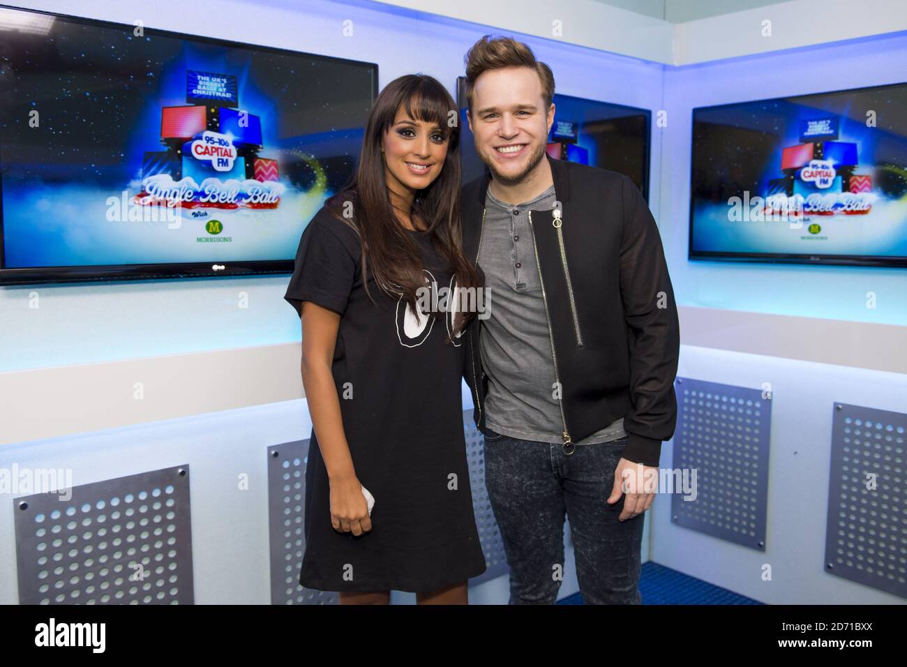 Olly Murs is interviewed by presenter Max Akhtar backstage at the Capital FM Jingle Bell Ball ...