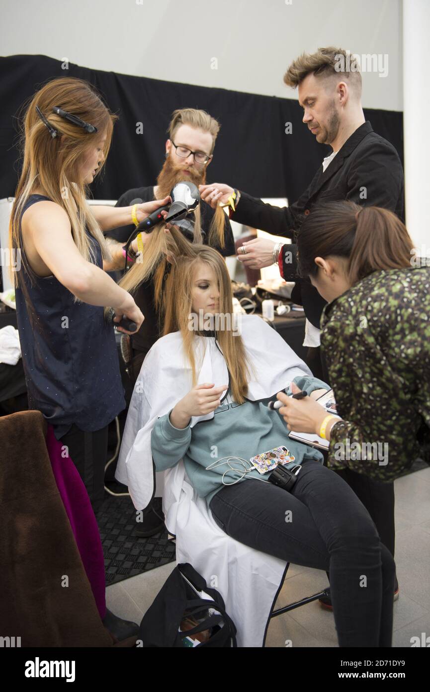 Models prepare backstage at the Pringle Fashion Show, held at the ...