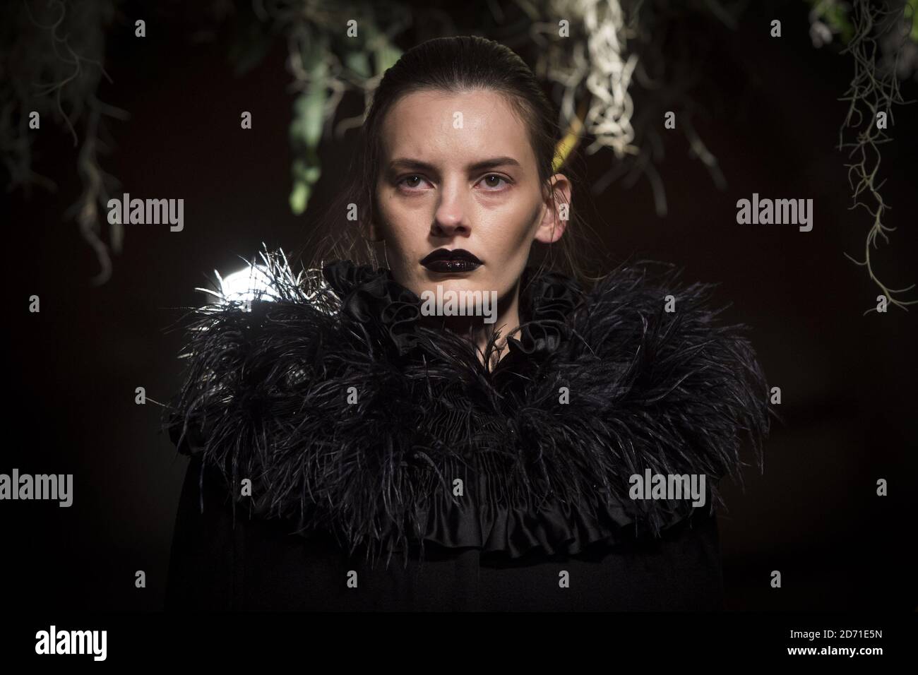 Models on the catwalk at the Giles fashion show, held at the old St ...