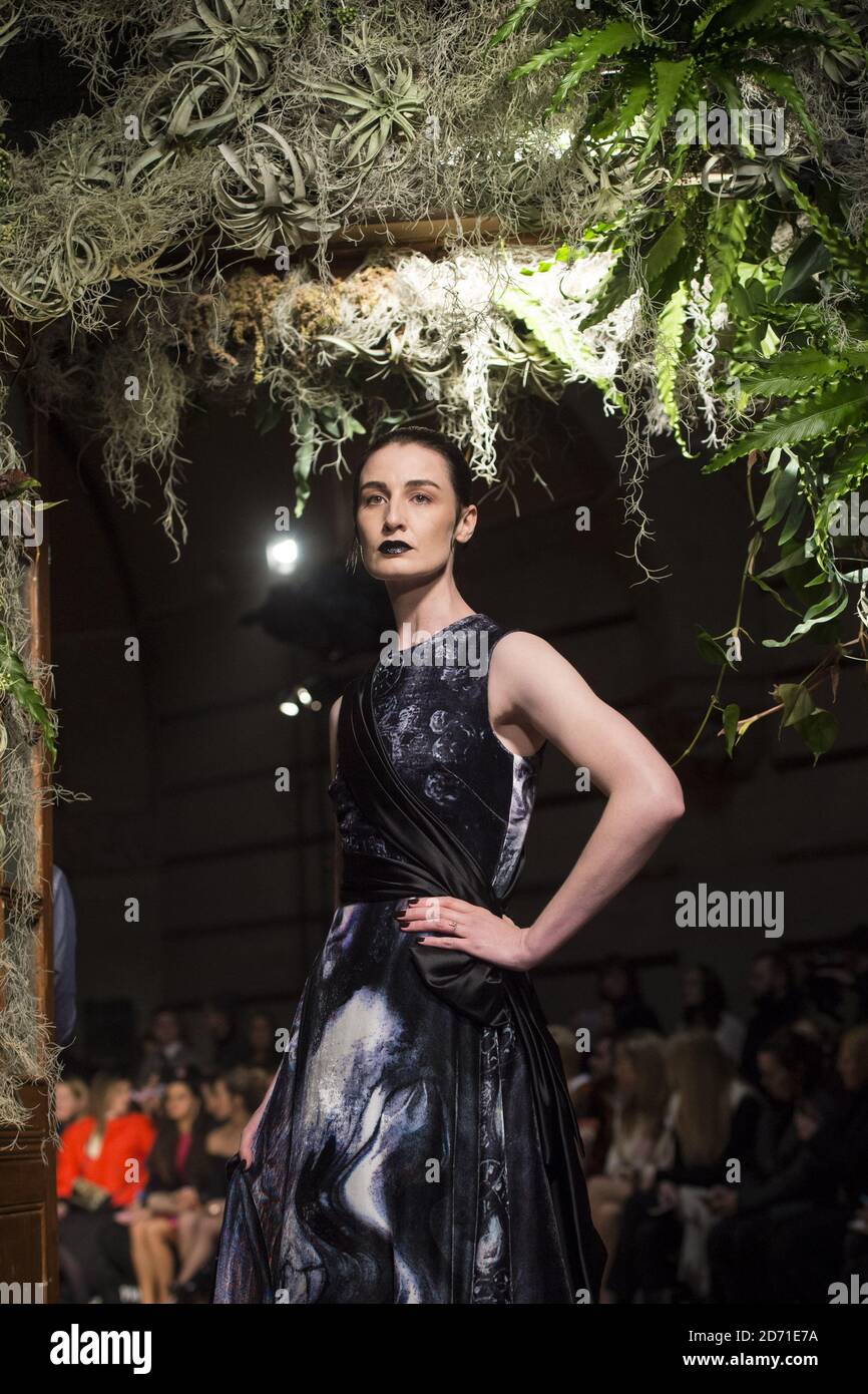 Erin O'Connor models on the catwalk at the Giles fashion show, held at ...