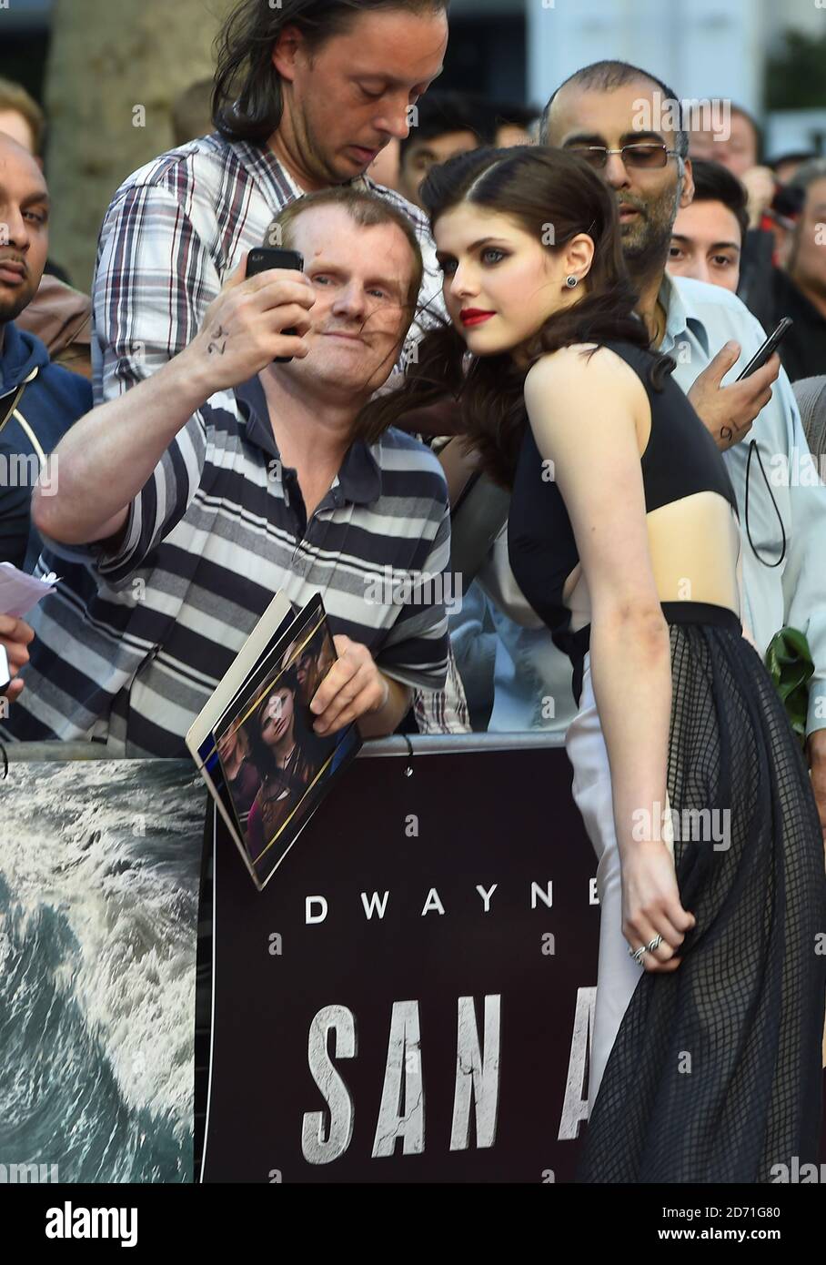 Alexandra Daddario signs autographs for fans during the San Andreas UK ...