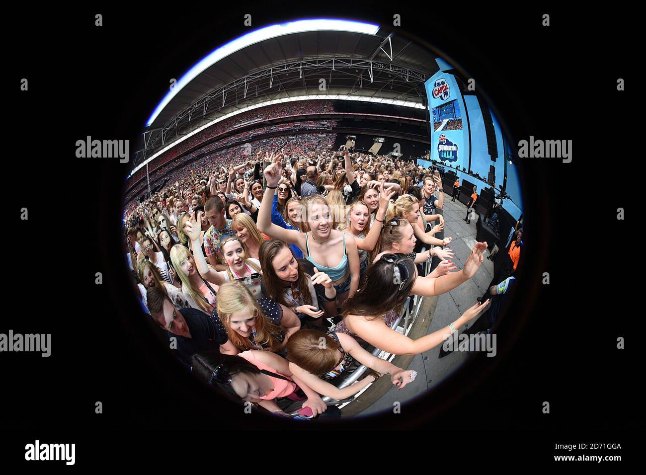 EXCLUSIVE Fan swatch One Direction perform on stage during Capital FM's ...