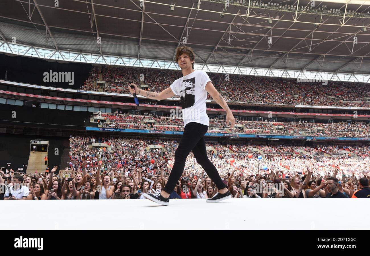 EXCLUSIVE Louis Tomlinson of One Direction performs on stage during ...