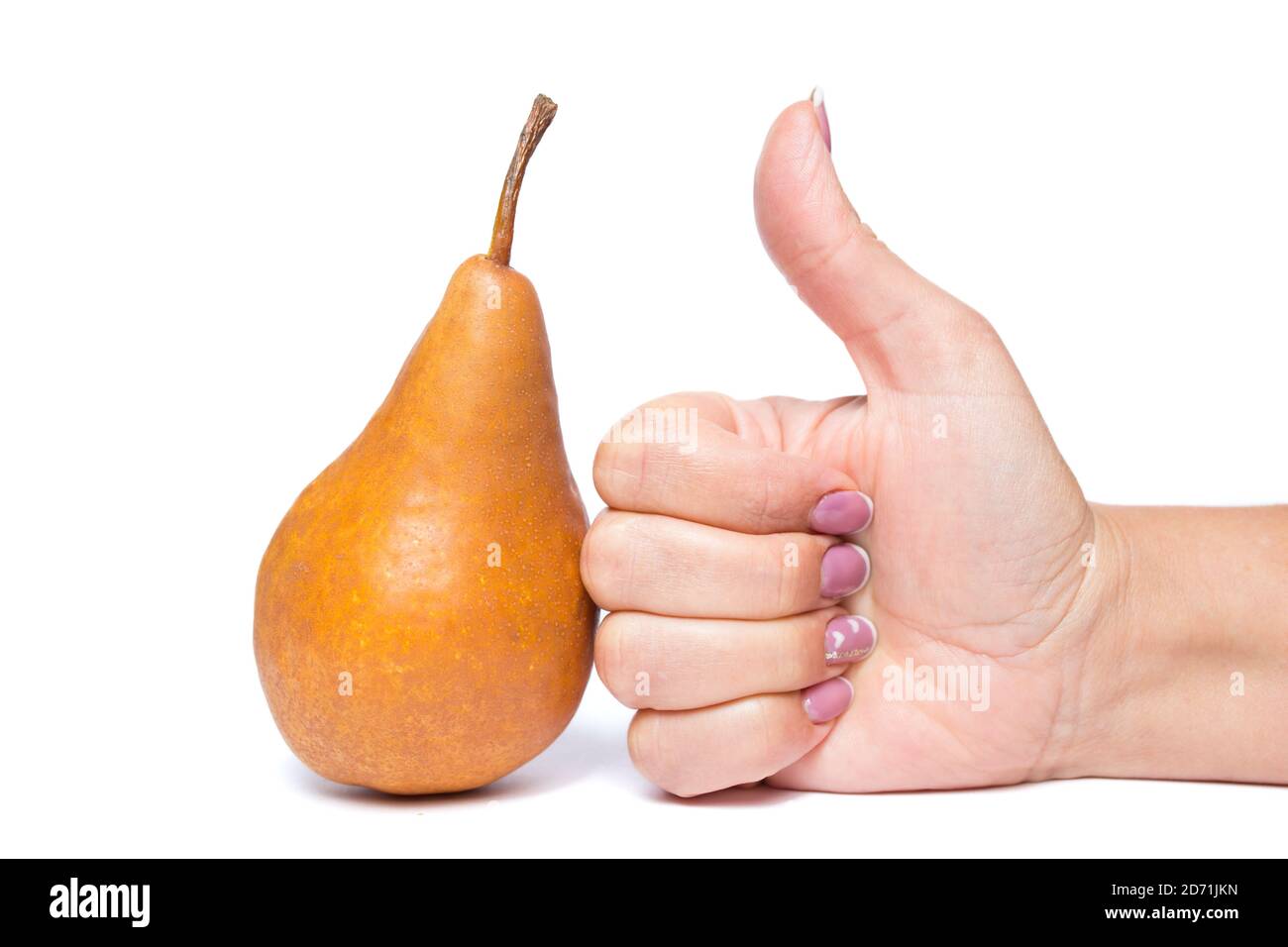 Hand showing like for fresh yellow pear close up, on a white background ...
