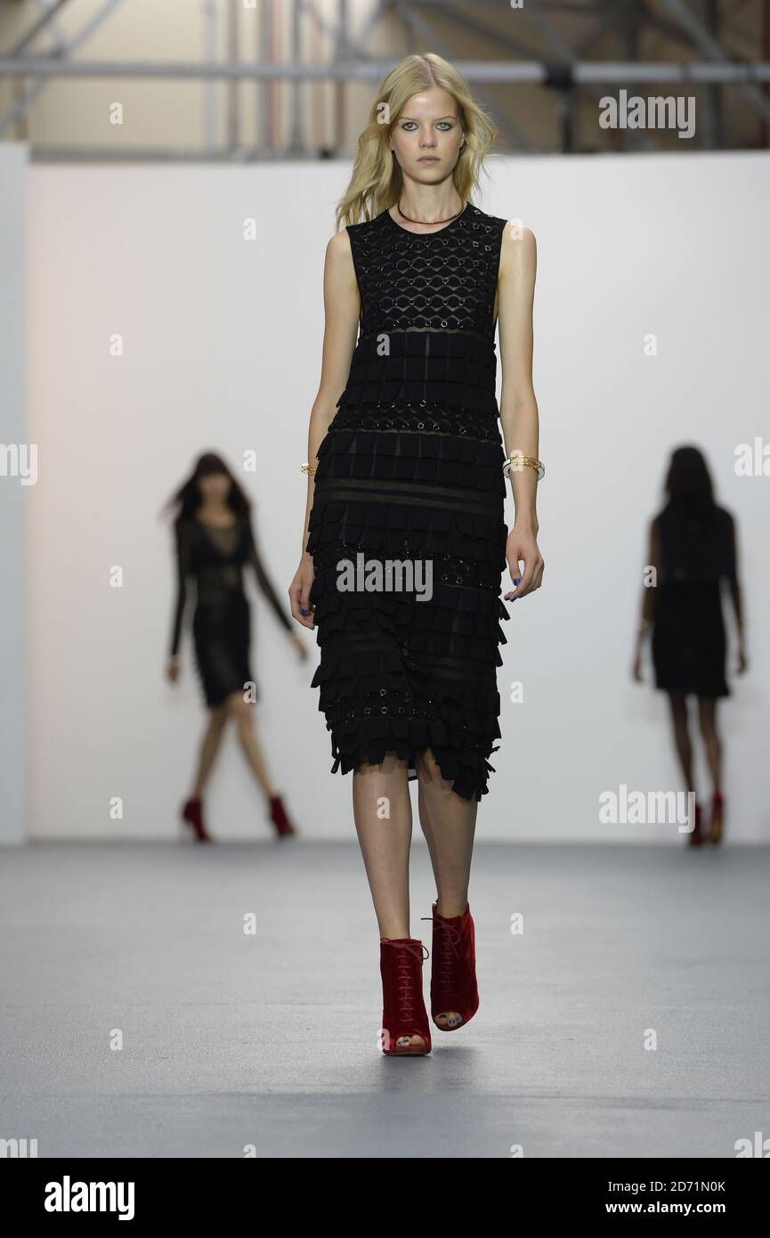 Models on the catwalk at the Issa fashion show, held at the BFC venue ...