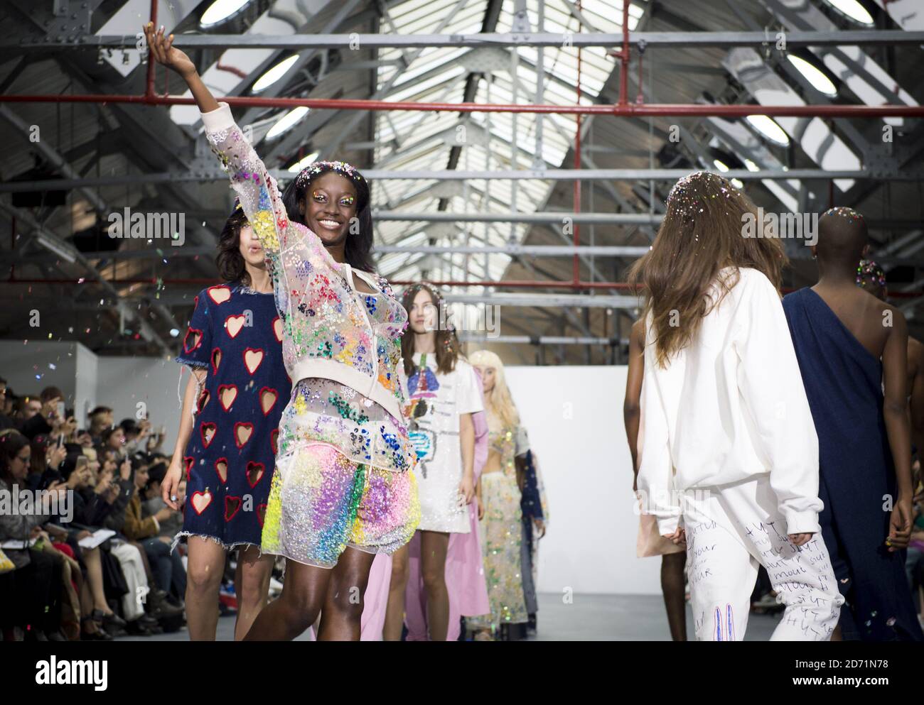 Models on the catwalk at the Ashish fashion show, held at the BFC venue ...