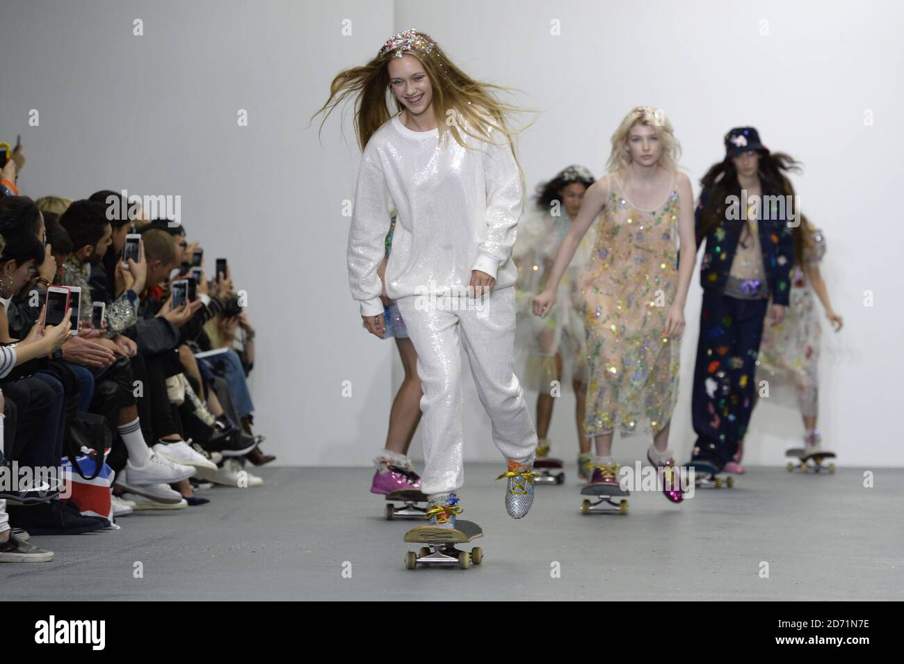 Models on the catwalk at the Ashish fashion show, held at the BFC venue ...
