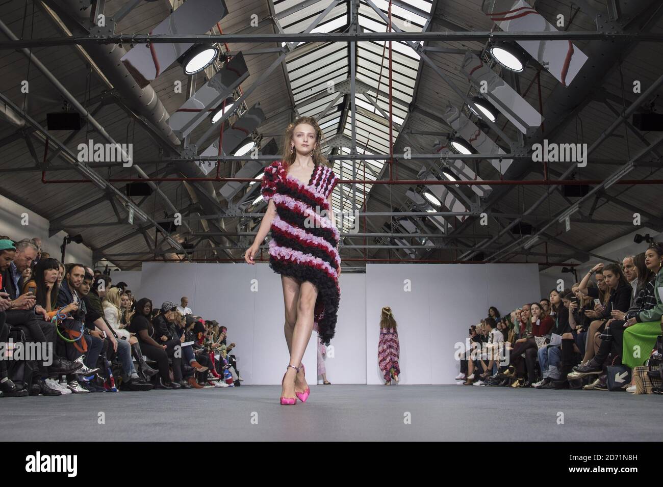 Models on the catwalk at the Ryan Lo fashion show, held at the BFC ...