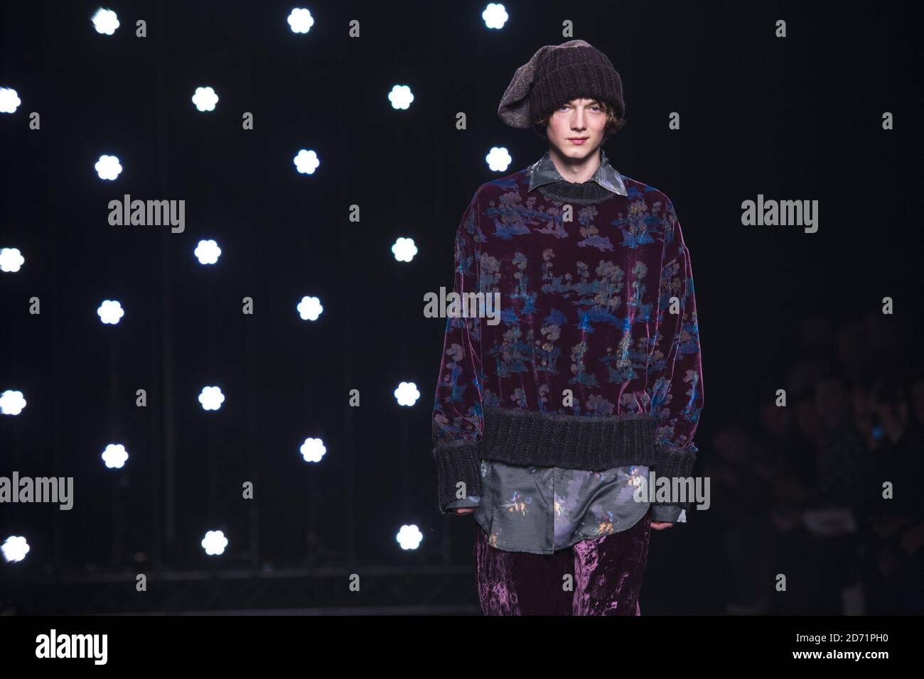Models on the catwalk at the TopMan fashion show, held in the ...