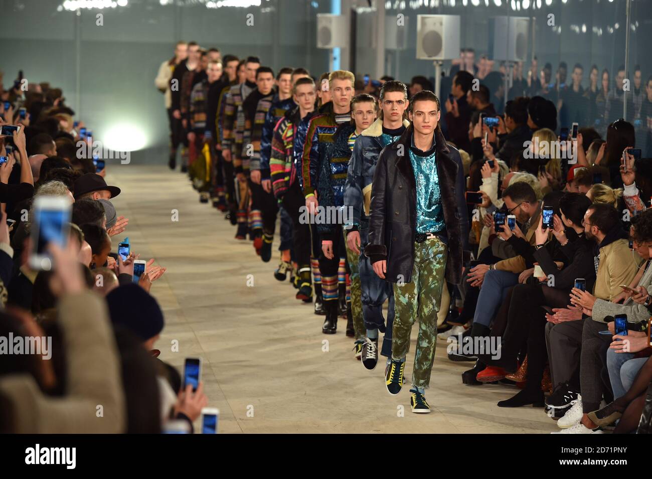 Models on the catwalk at the James Long Fashion show, held as part of ...