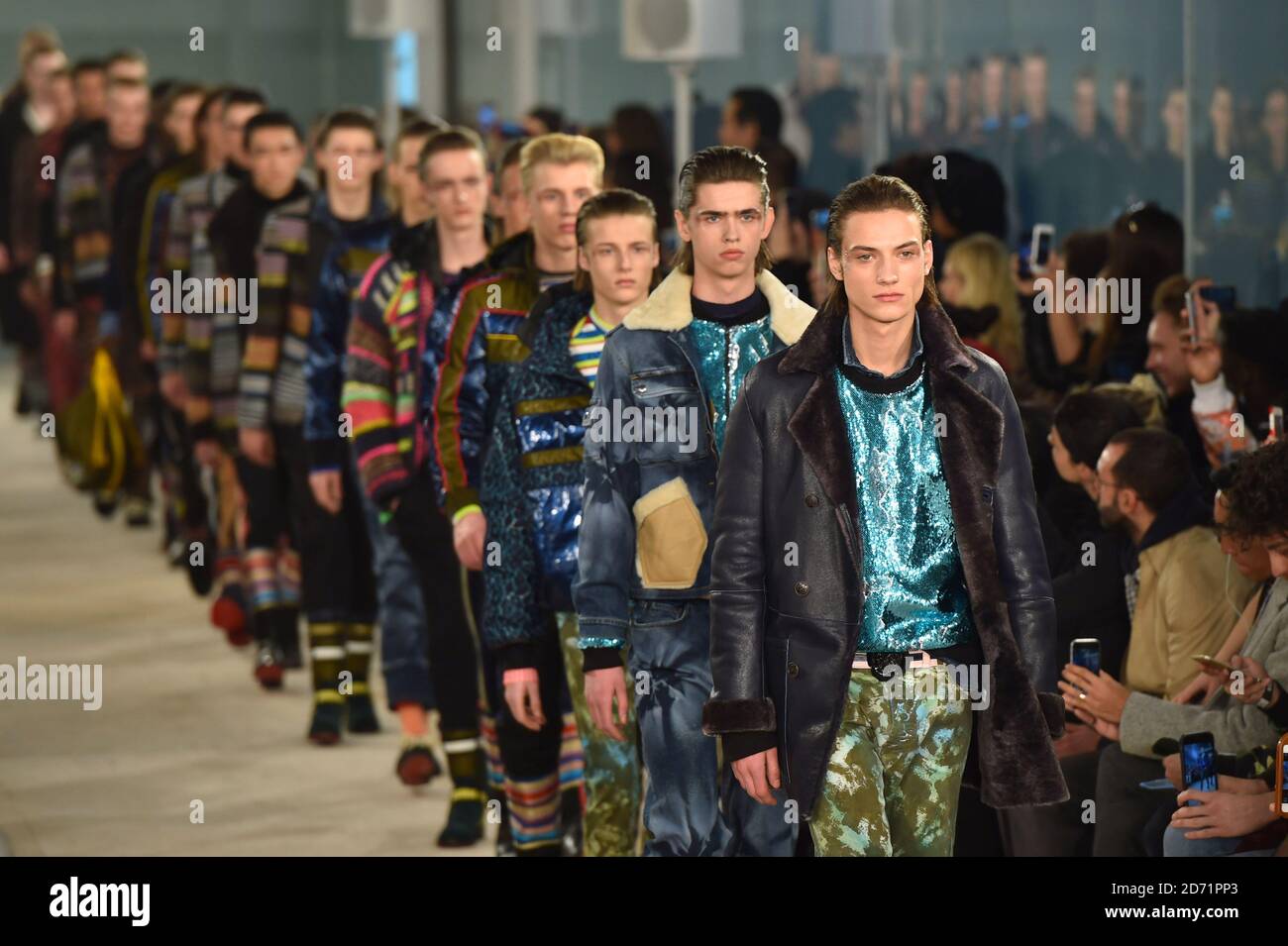 Models on the catwalk at the James Long Fashion show, held as part of ...