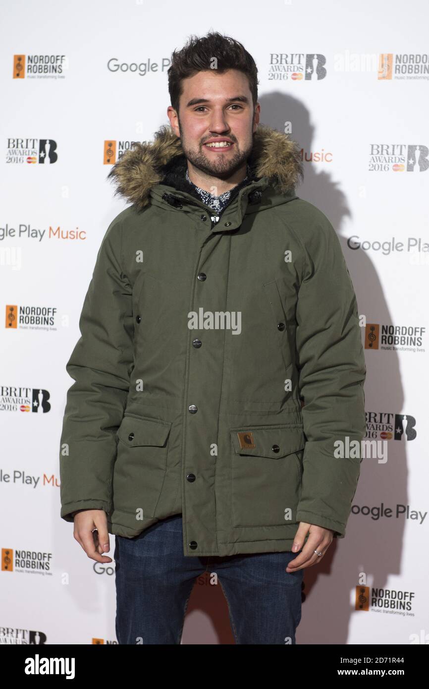 Philip George at the Google Play Music Official BRITs noms after party ...