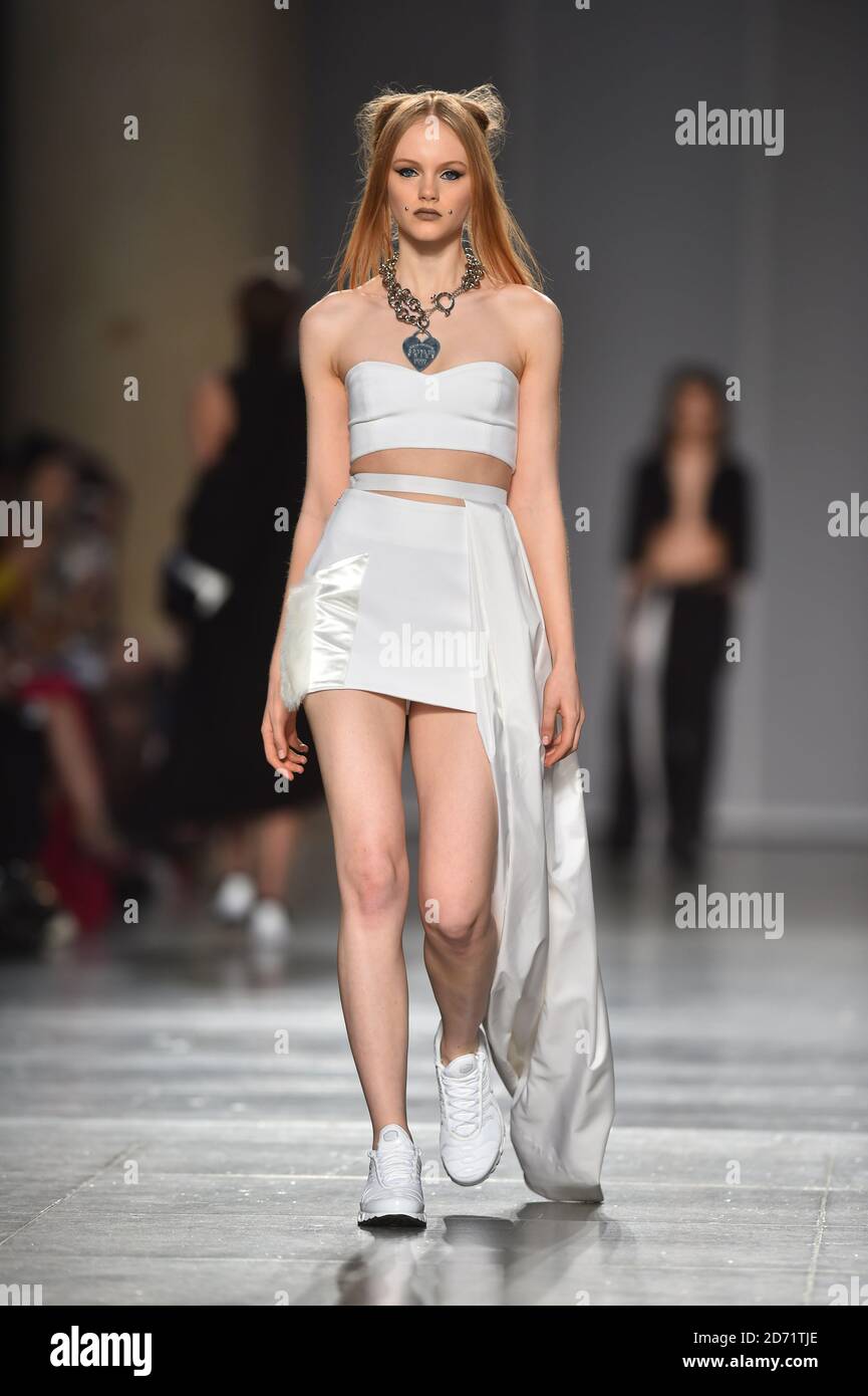 Models wear designs by Caitlin Price during the Fashion East Autumn ...