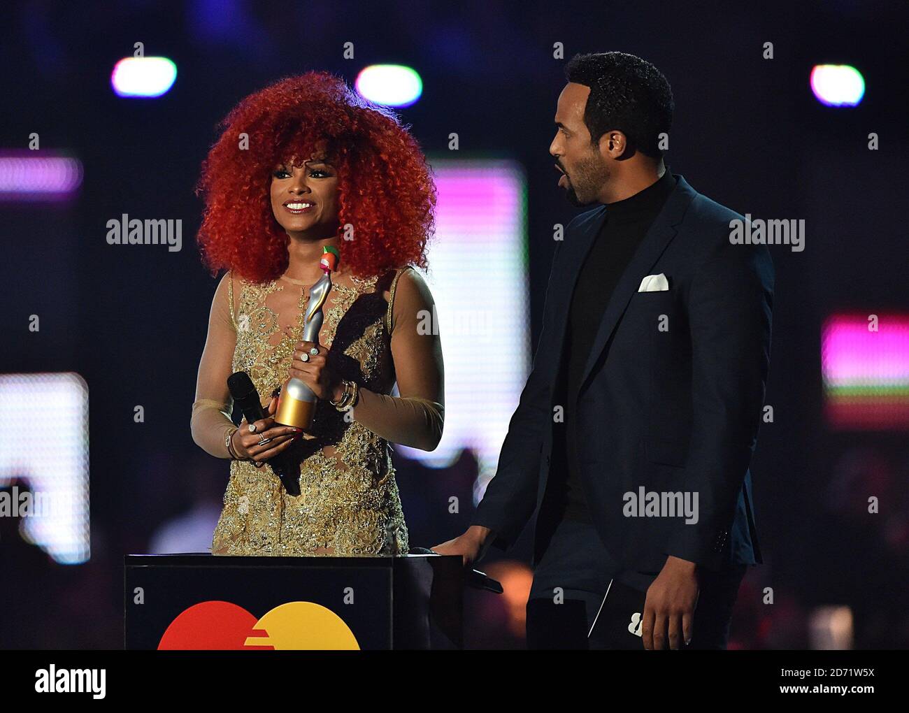 Fleur East and Craig David on stage during the 2016 Brit Awards at the ...