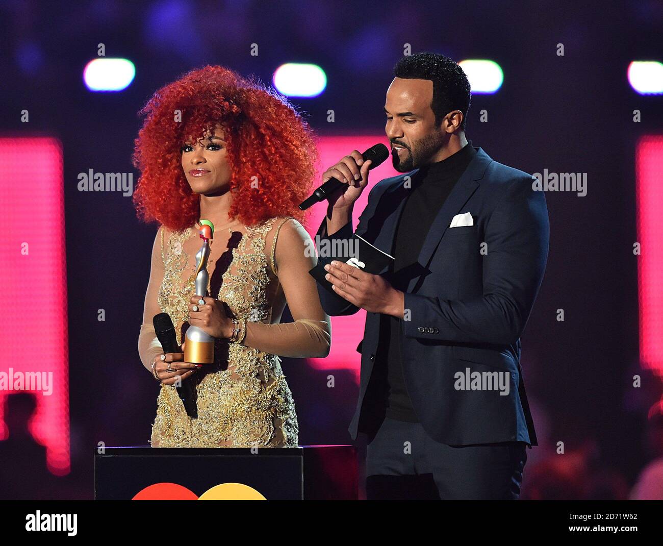 Fleur East and Craig David on stage during the 2016 Brit Awards at the ...