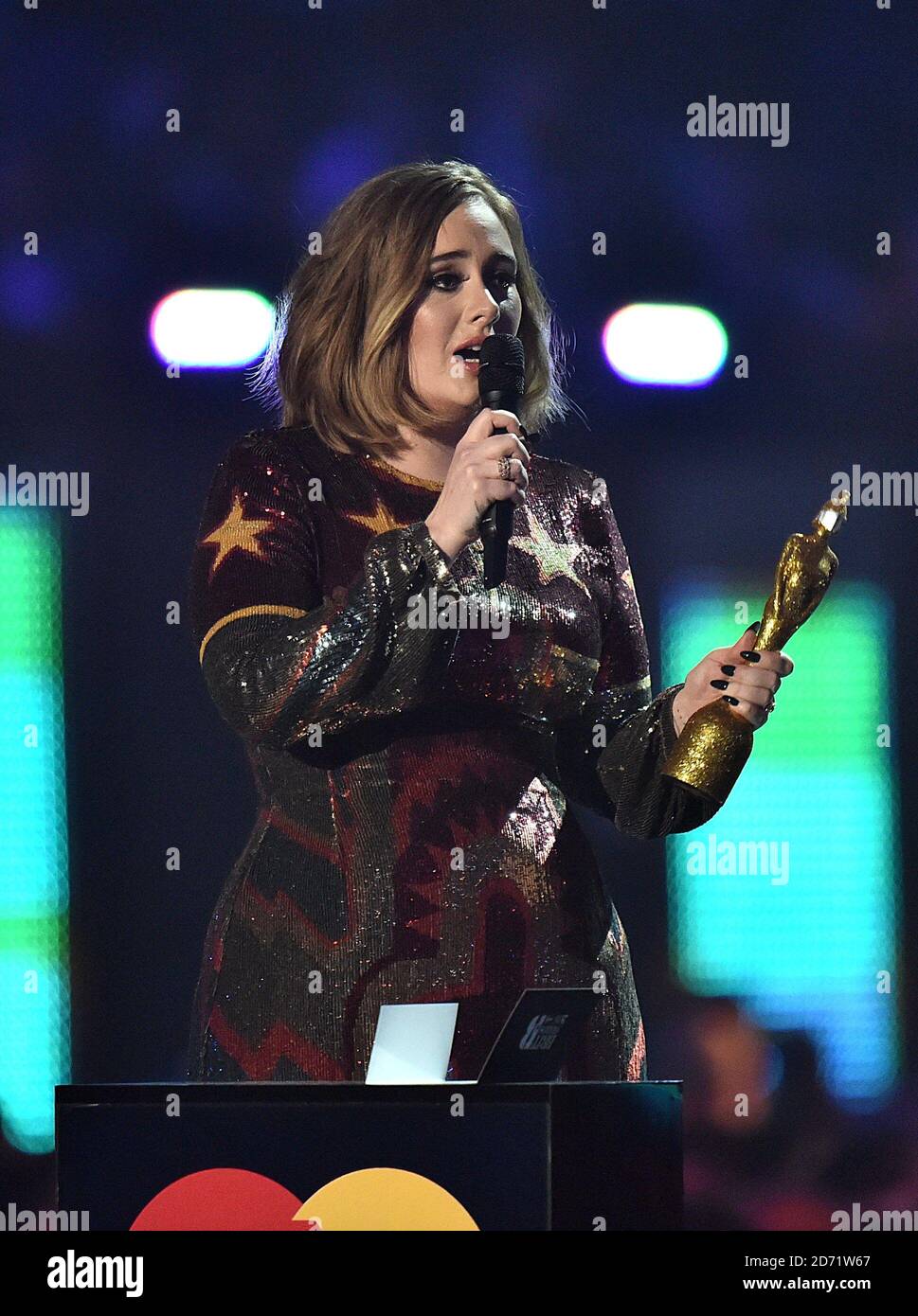 Adele collects the award for Best British Album on stage during the ...