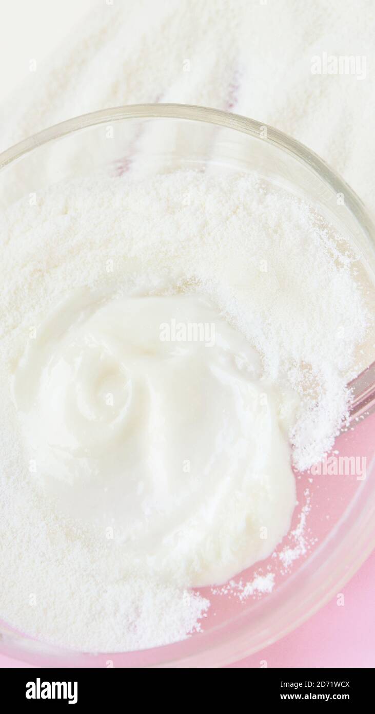 Collagen white powder. Pastel color background. Health product Stock ...