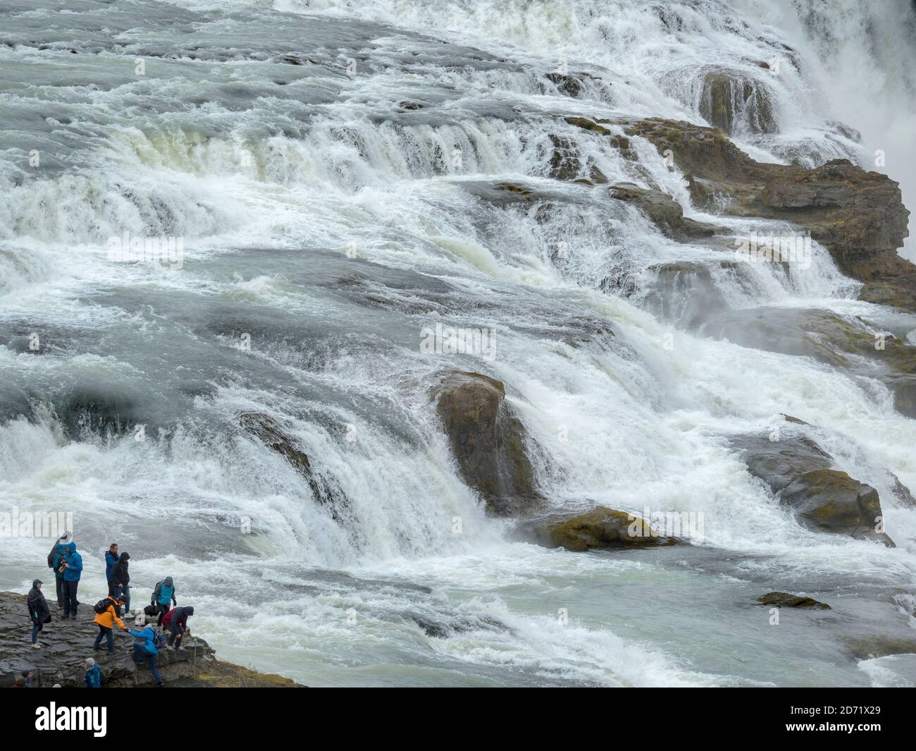 Waterfall Gullfoss part of the Golden Circle in Iceland. Visitors ...