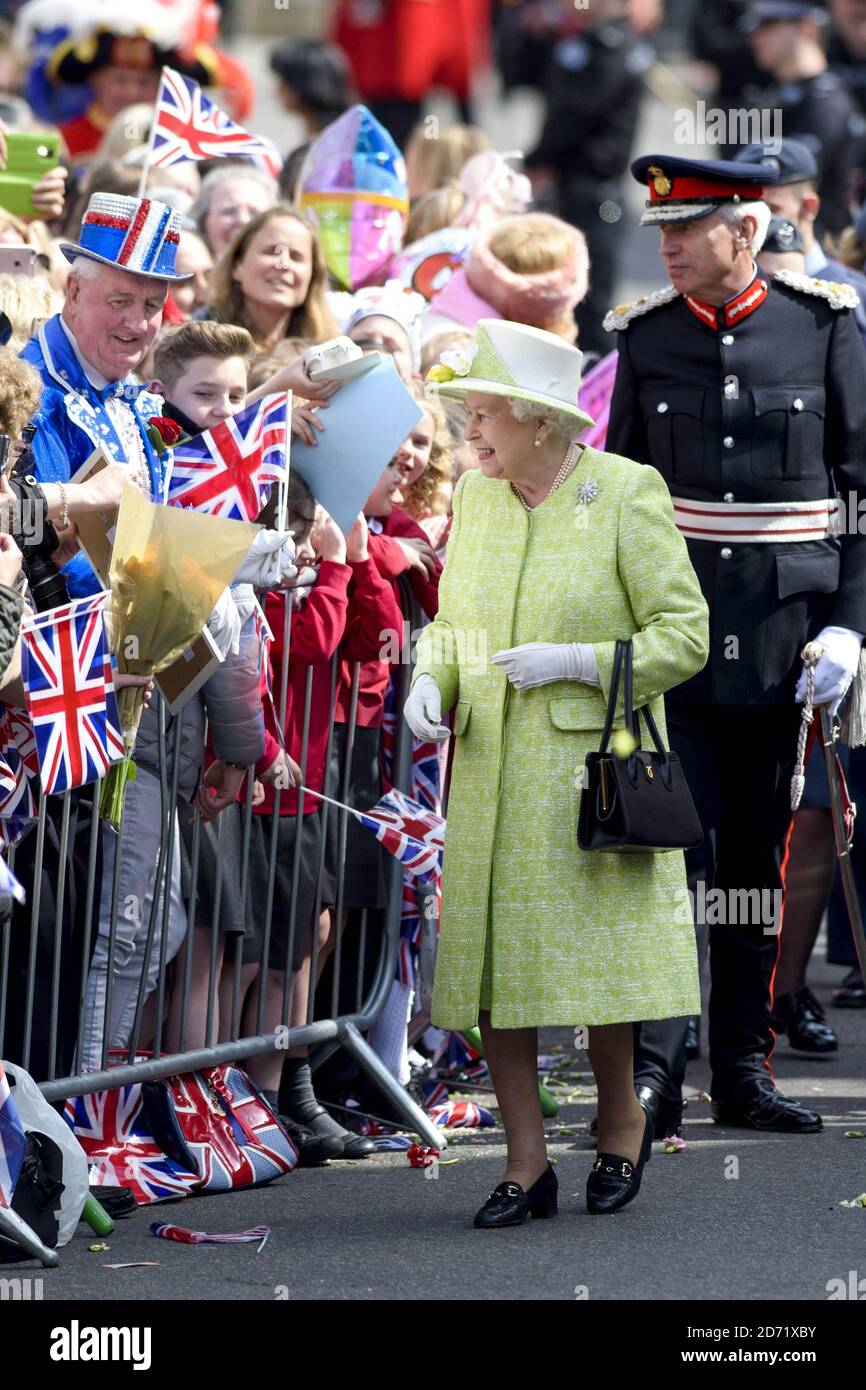 Queen Elizabeth II greets crowds outside Windsor Castle in Berkshire as ...