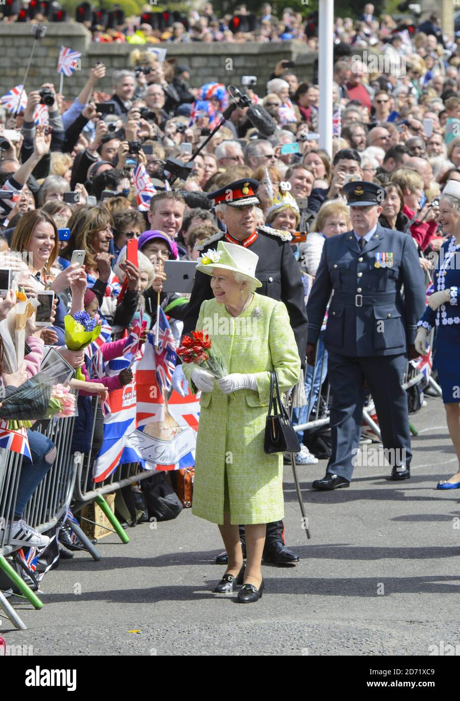 Queen Elizabeth II greets crowds outside Windsor Castle in Berkshire as ...
